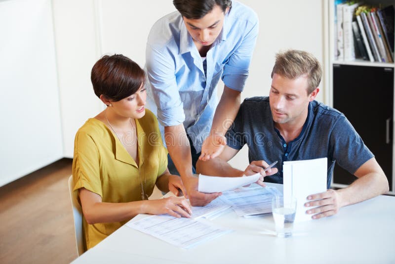 Let Me Take a Look. a Business Meeting in Progress. Stock Photo - Image ...