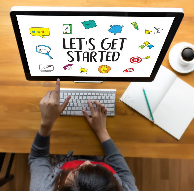 LET S GET STARTED Two Businessman Working at Office Desk and Usi Stock ...