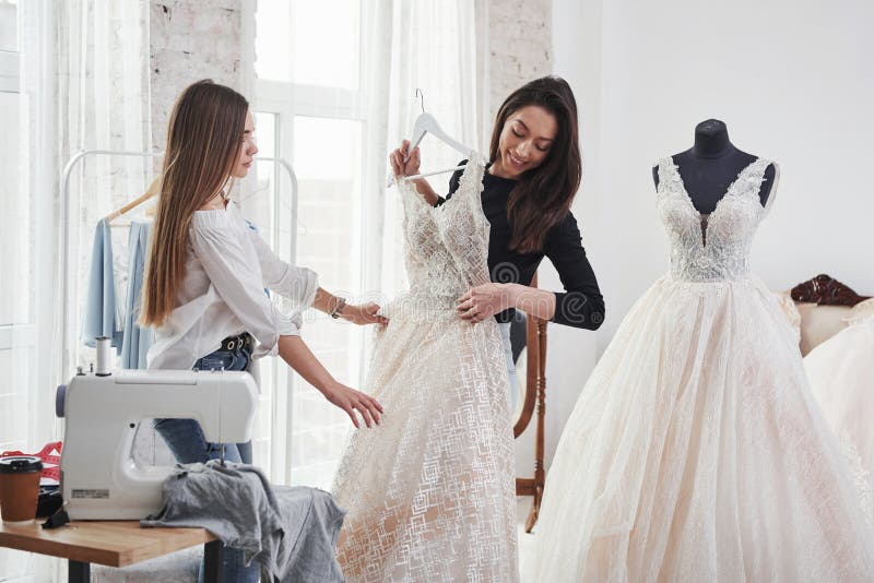 Let`s Try this One. the Process of Fitting the Dress in the Studio of ...