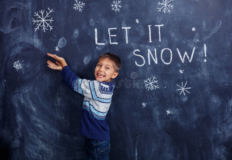 Boy with Snow in studio stock photo. Image of flake - 104323080