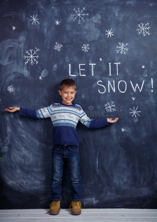 Boy with Snow in studio stock image. Image of holiday - 104950171