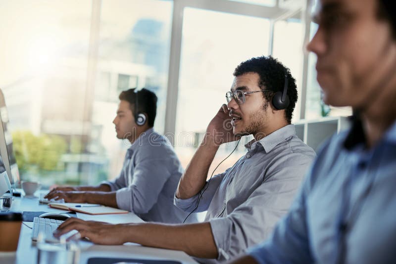 Let Them Help You. Call Centre Agents Working in an Office. Stock Photo ...