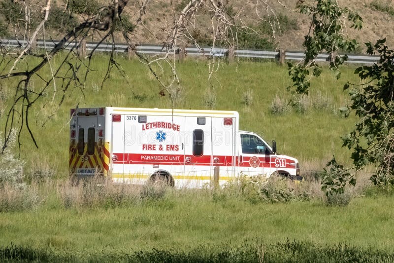 A Side View of a Lethbridge Fire CMS Ambulance Attending an Emergency ...