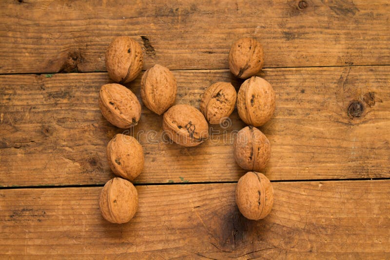 Letra M Hecha De Las Nueces Foto de archivo - Imagen de fondo, estudio ...
