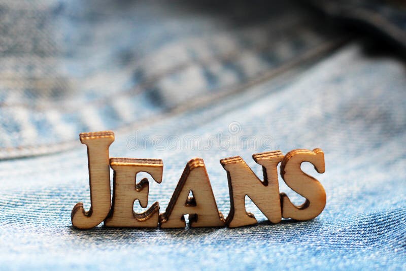Letras De Madera Y Vaqueros Imagen de archivo - Imagen de extracto ...
