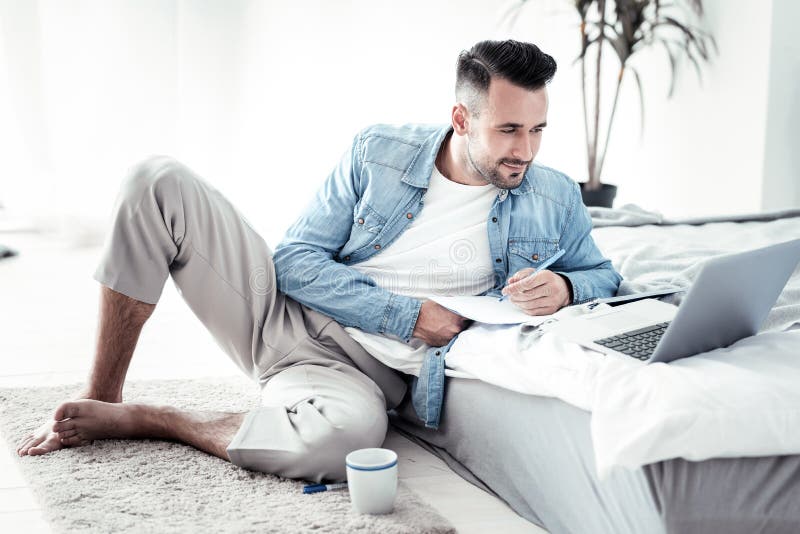 Cheerful Brunette Male Making Notes Stock Image - Image of elearning ...