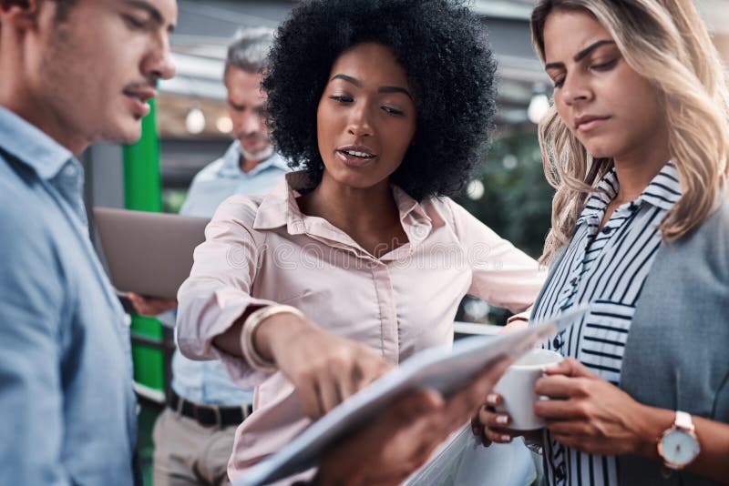 Lets Change this Up a Bit. a Group of Businesspeople Going through ...