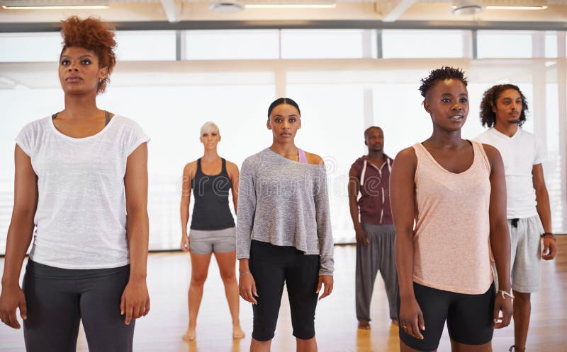 Lets Dance. a Group of Young Dancers Standing Together in a Studio ...