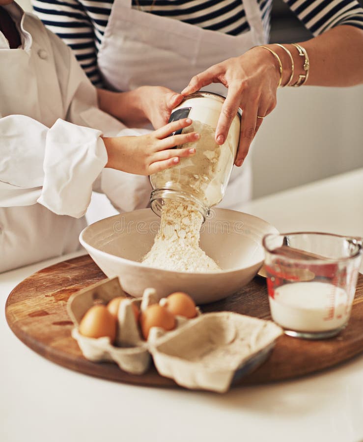 Lets Get Baking. a Mother and Her Son Baking in the Kitchen. Stock ...