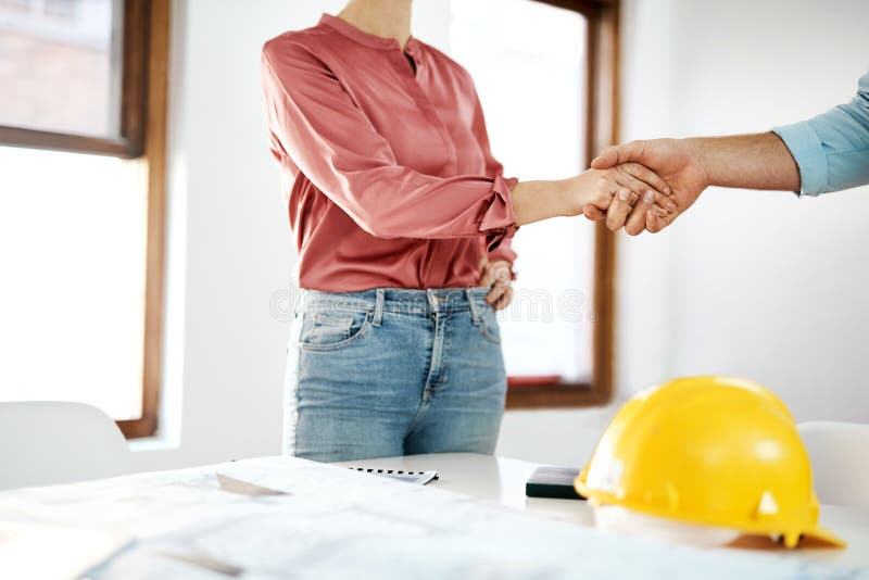 Lets Get this Building Started. Two Unrecognizable Businesspeople ...