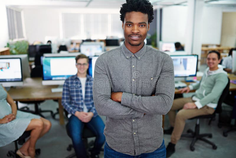 Lets Get this Project Started. Portrait of a Young Man Standing in an ...