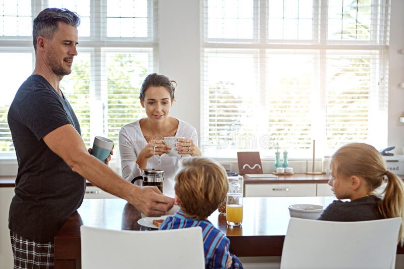 Lets Get Ready for a Fun Day Ahead...a Family Having Breakfast Together ...