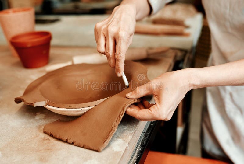Lets Get Rid of the Excess Clay. an Unrecognizable Artisan Working in a ...