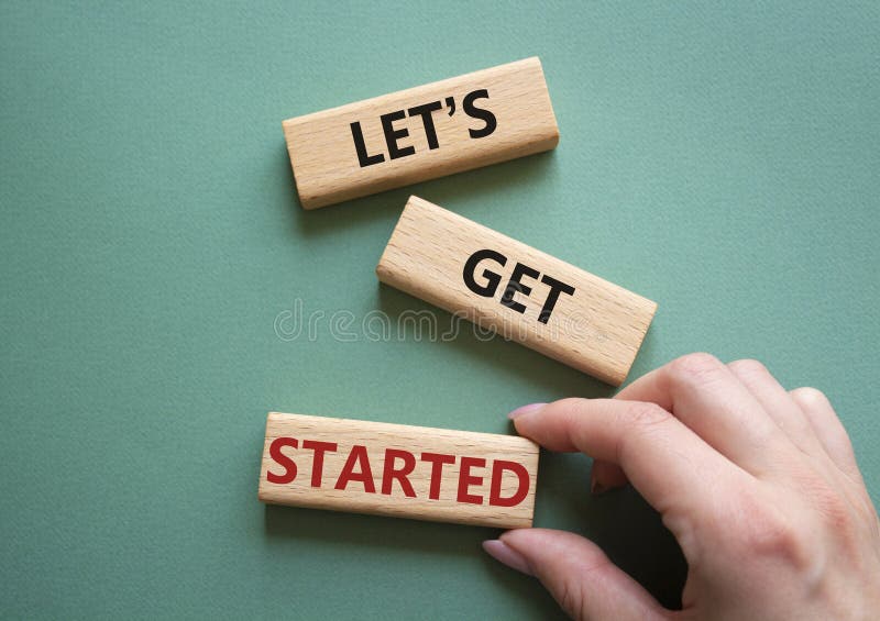 Lets Get Started Symbol. Concept Words Lets Get Started on Wooden ... Lets Get Started Symbol. Concept Words Lets Get Started on Wooden ...