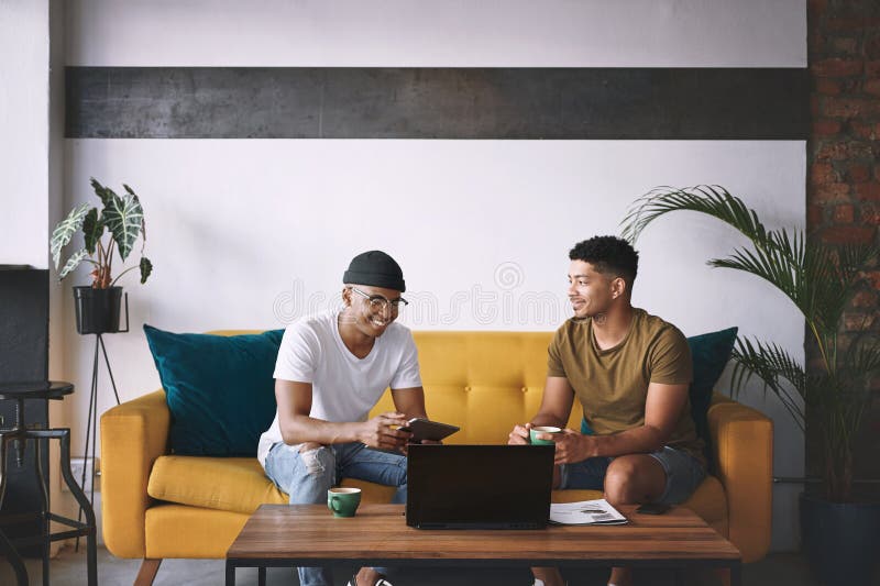 Lets Make this Business Happen Already. Two Men Using a Laptop and a ...