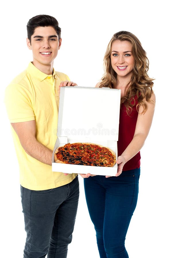 Lets share the yummy pizza stock photo. Image of holding - 31308000
