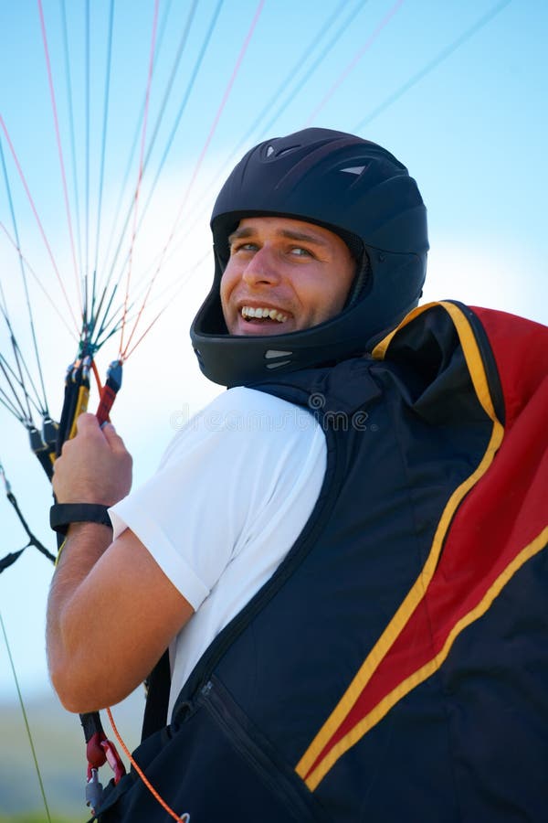 Lets Take To the Sky. a Man Paragliding on a Sunny Day. Stock Image ...