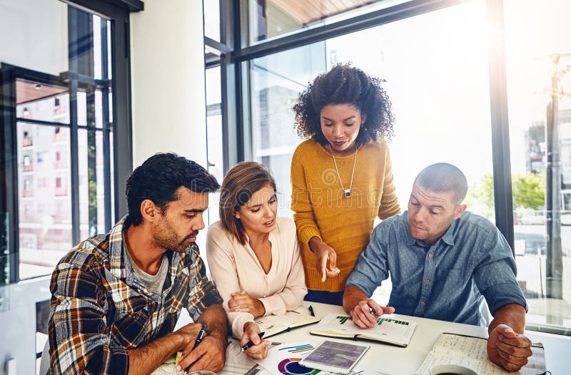 Lets Work through the Basics First. a Team of Designers Having a ...