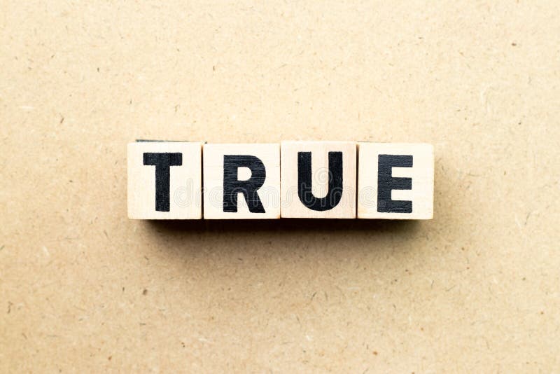 Word TRUE is Written on Wooden Cubes on a Bright Yellow Surface ...