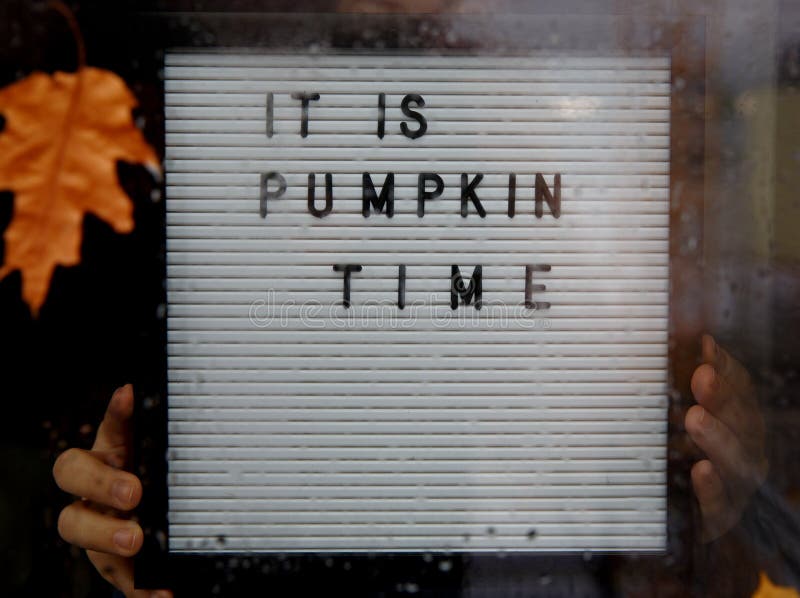 Letter Board Though the Window with Wet Leaves and Raindrops Stock ...