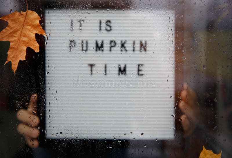 Letter Board Though The Window With Wet Leaves And Raindrops Stock ...