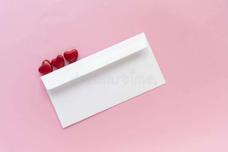 Letter Card with Small Red Hearts on a Pink Background Stock Photo ...
