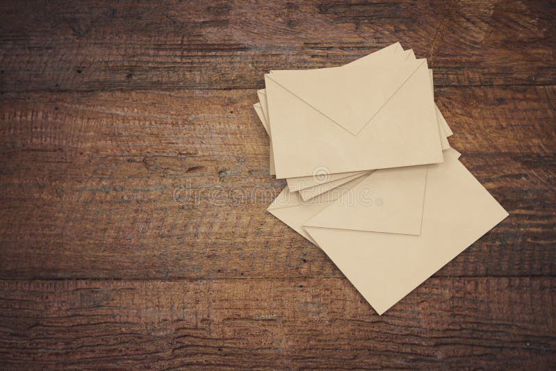 Letter Envelopes for Mail Postage on Wooden Table Stock Photo - Image ...