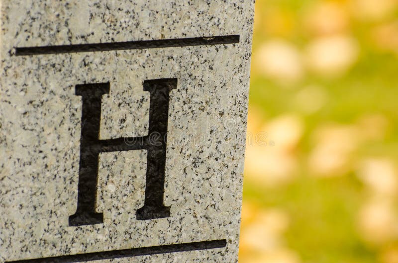 Letter H on stone post stock image. Image of alphabet - 82314641