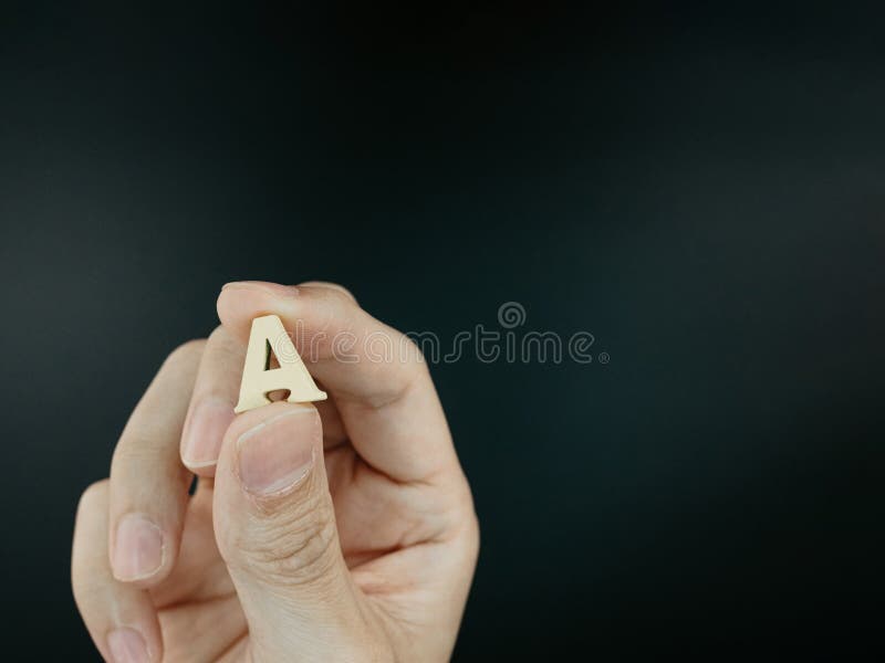 A Letter Hand Holding with Dark Background Stock Photo - Image of ...