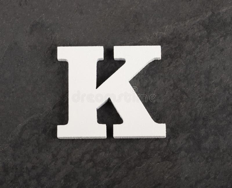 Letter K from Blank Alphabet on Gray Background - Top View Stock ...