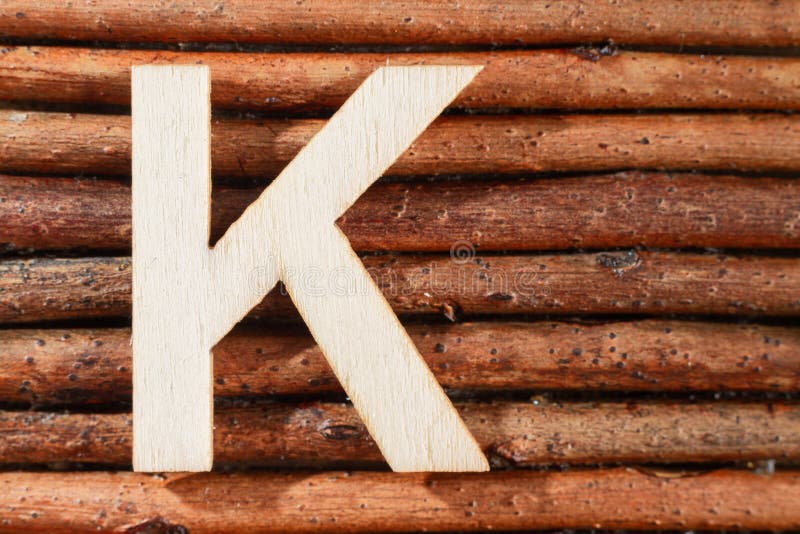 Letter K of Wood-made Alphabet, Top View and Space for Text Stock Photo ...
