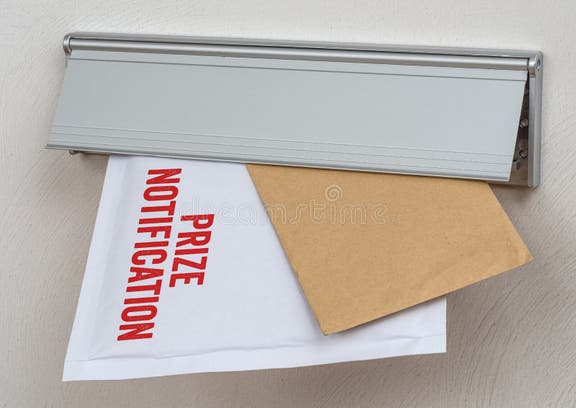 A Letter Labeled Prize Notification in a Mail Slot Stock Image - Image ...