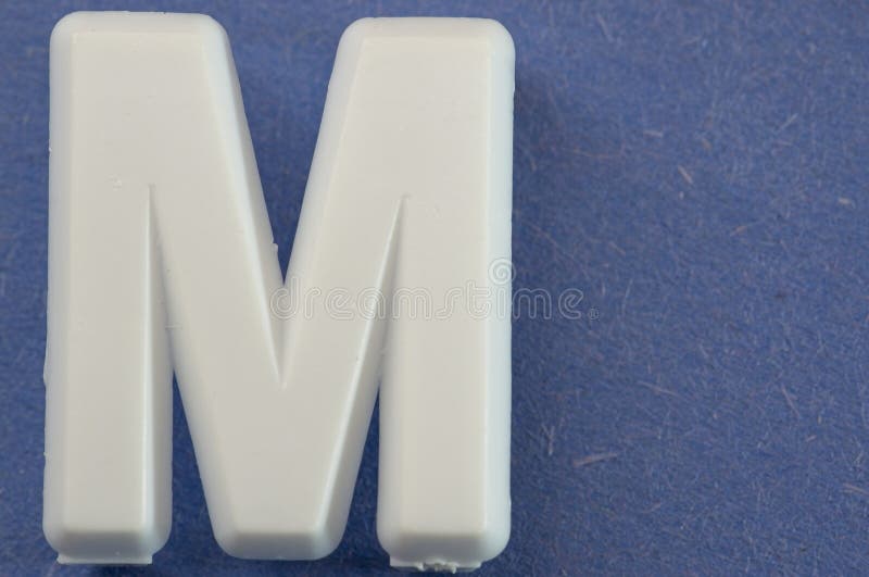 Capital M on blue stock image. Image of abstract, system - 308002583