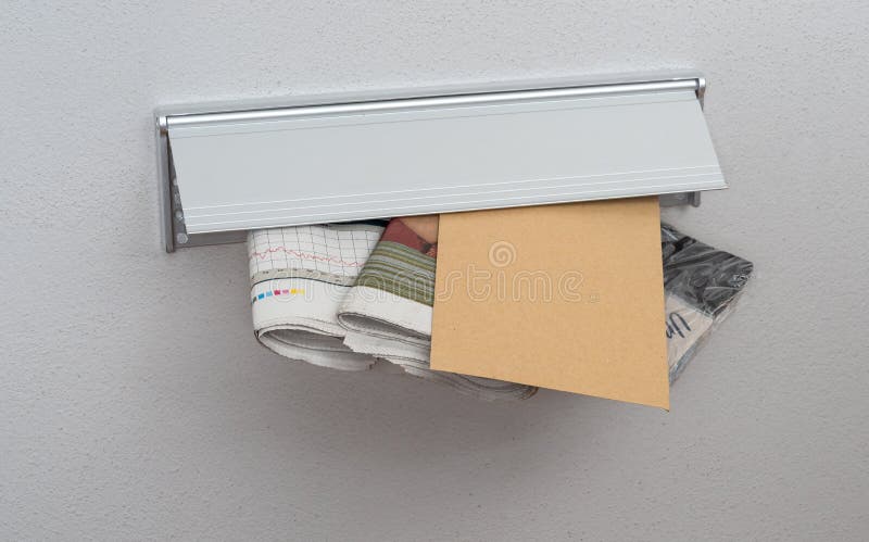 A Letter and Newspapers in a Mail Slot Stock Image - Image of advert ...