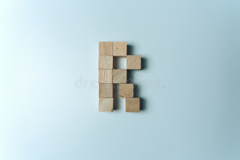Letter R from wooden dice stock photo. Image of business - 237874980