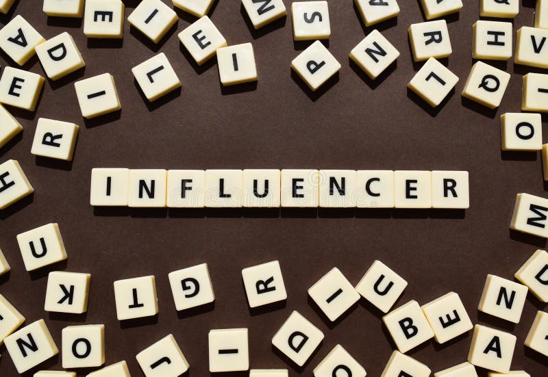 Influence letter tiles stock image. Image of element - 252909189
