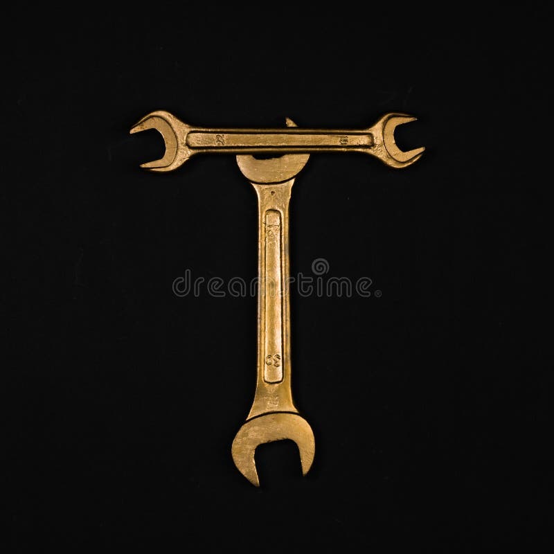 Letter T. Alphabet Made of Golden Repair Tools Stock Photo - Image of ...