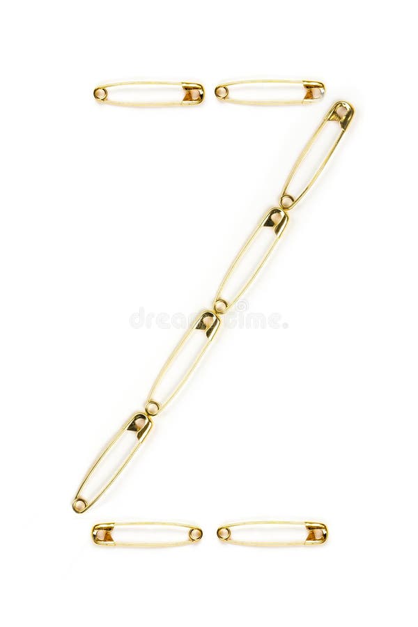 Letter Spelled Out in Gold Colored Safety Pins Stock Photo - Image of ...