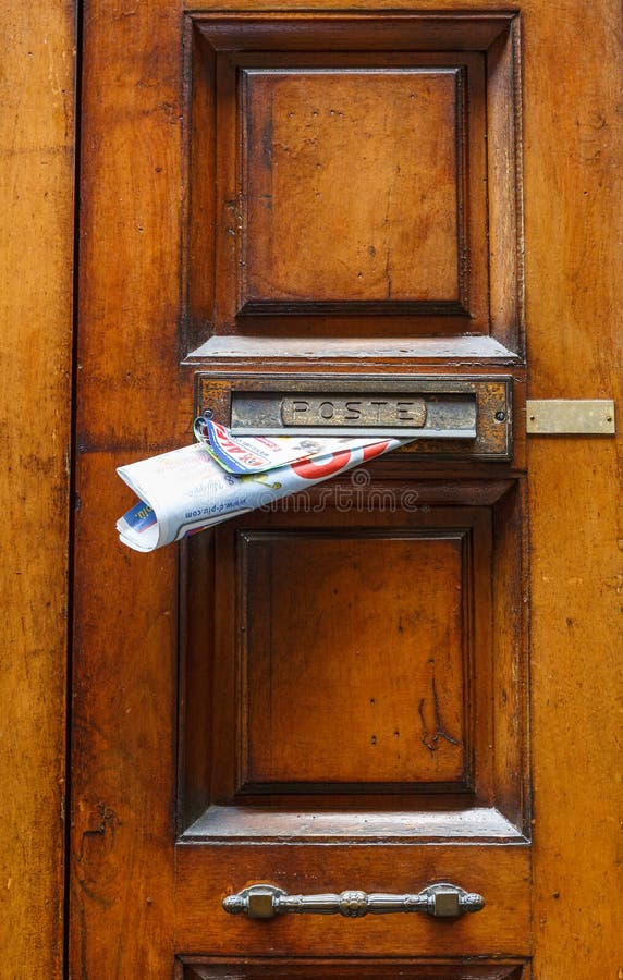 Letterbox in a Door with Advertising Stock Photo - Image of brown, mail ...