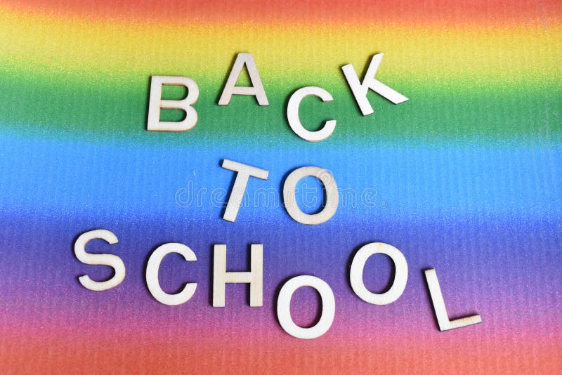 Lettering Back To School with Crayons on the Rainbow Background Stock ...