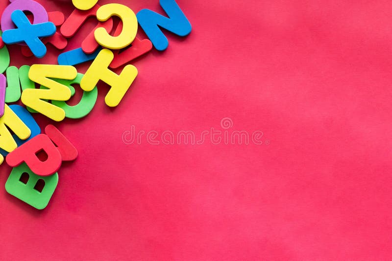 Letters of the Alphabet in Different Colors on a Red Background ...