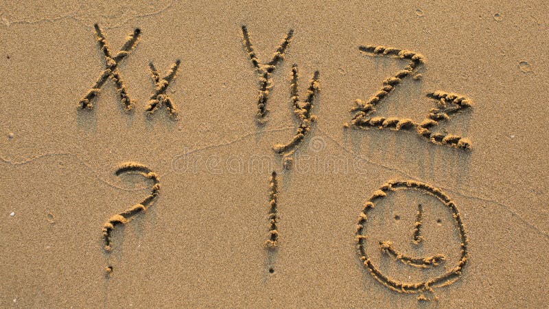 Letters of the Alphabet Written on Sandy Beach Stock Photo - Image of ...
