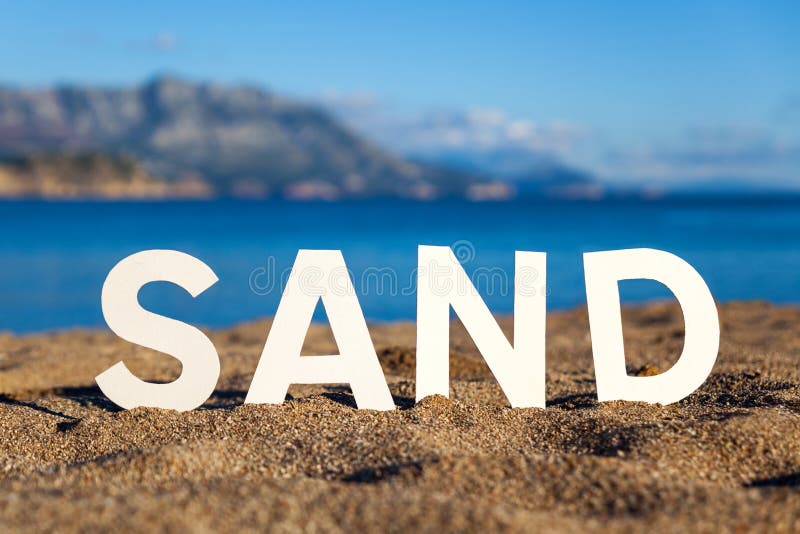 Letters on a beach stock photo. Image of clouds, blur - 80187958