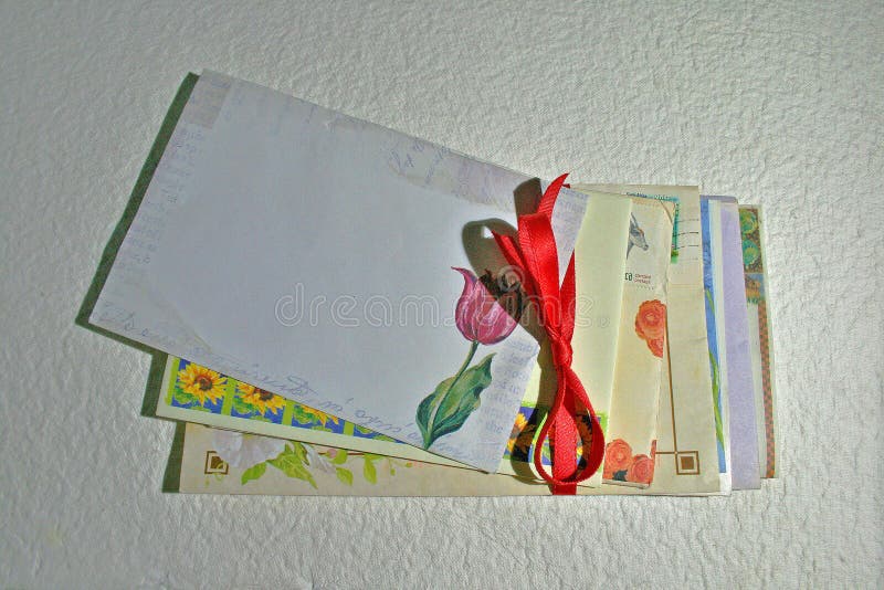 LETTERS BOUND with RED RIBBON Stock Photo - Image of white, smooth ...