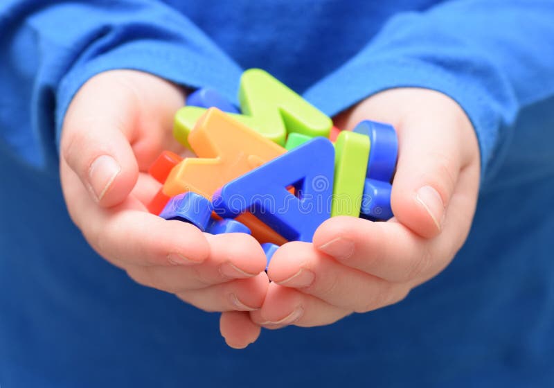 Letters are in hands stock photo. Image of finger, knowledge - 84777532