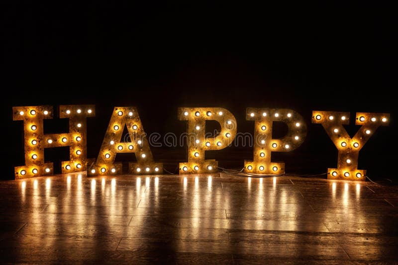 Letters happy with light stock image. Image of bulb - 111202907