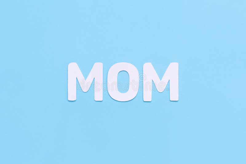 Letters MOM on a Light Blue Background Stock Photo - Image of minimal ...