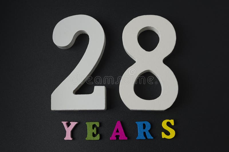 Letters and Numbers Twenty-eight Years on a Black Background. Stock ...