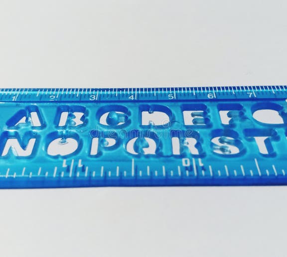 Letters on the ruler stock photo. Image of letters, number - 226422892