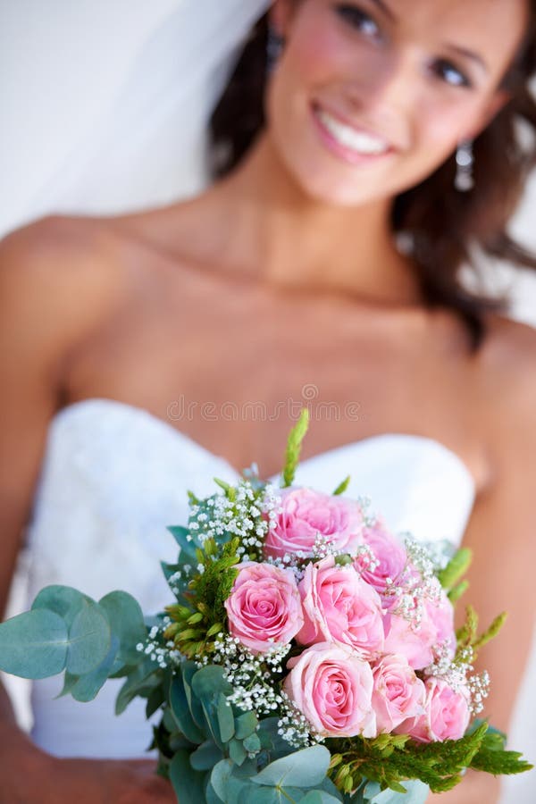 Letting the Nerves Subside. a Gorgeous Young Bride Holding Her Bouquet ...